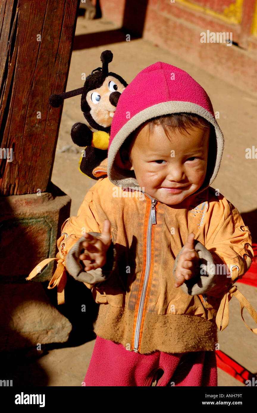 A boy in the garden play Stock Photo - Alamy