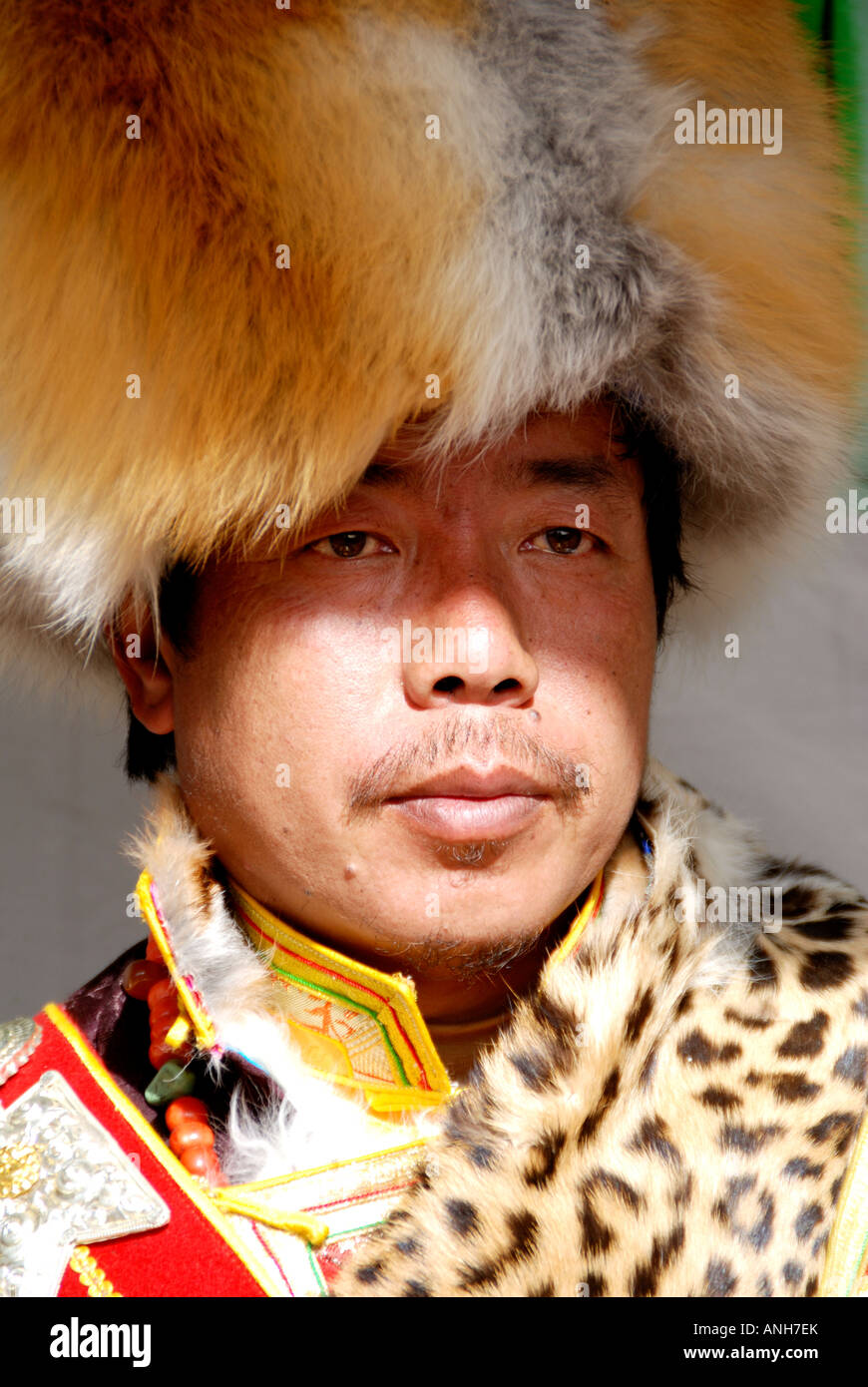Tibetan man traditional costume hi-res stock photography and images - Alamy