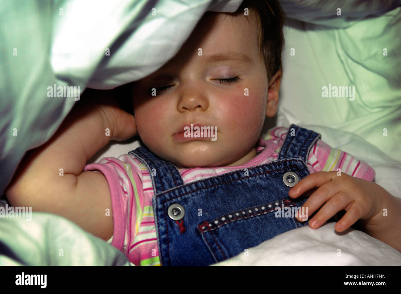 baby girl sleeping nine months old colour portrait rest Stock Photo - Alamy