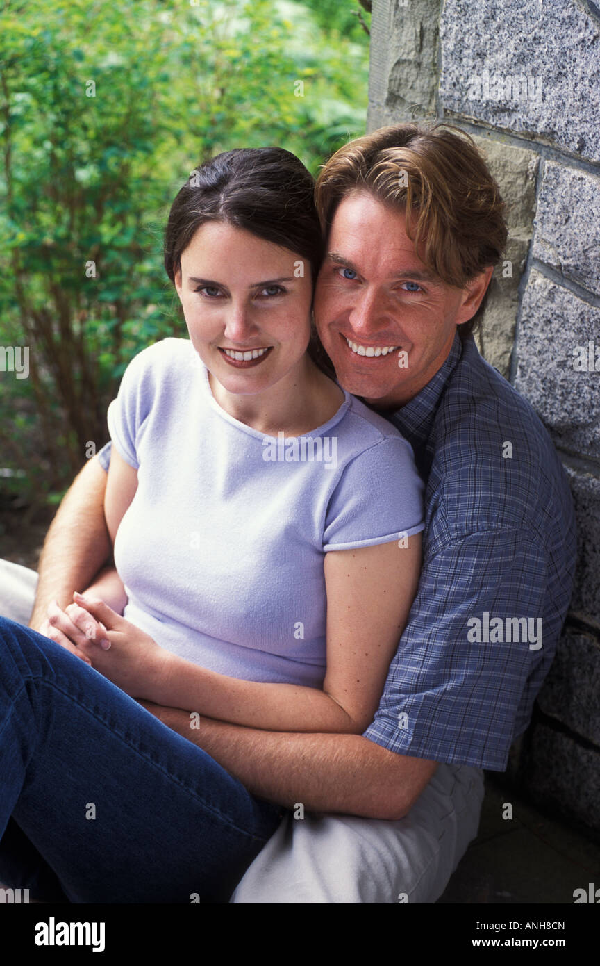 A couple sitting together, British Columbia, Canada Stock Photo - Alamy