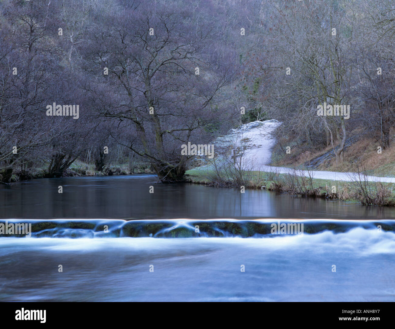 River Dove in Dovedale gorge on frosty morning in winter in White Peak ...
