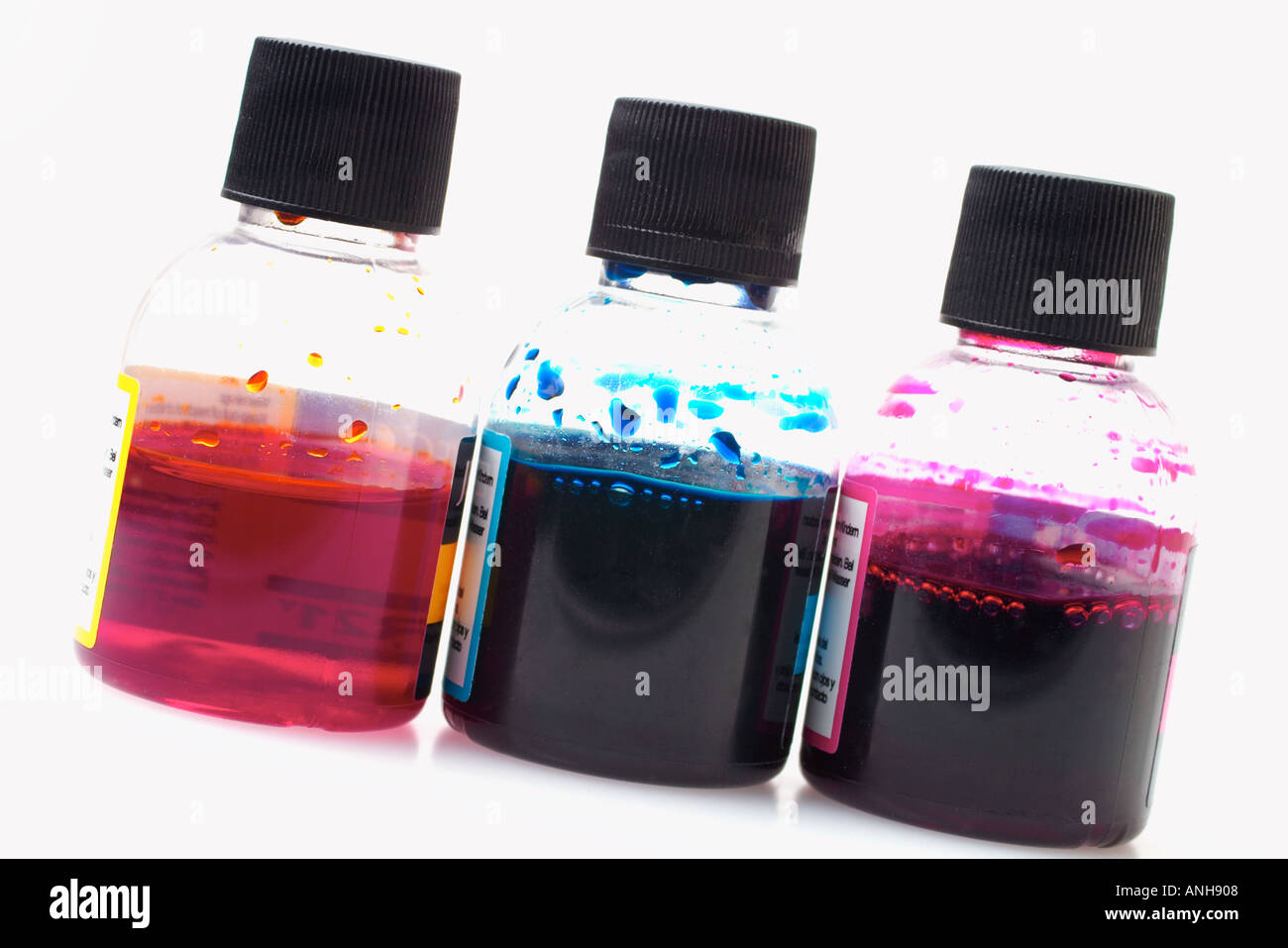 Three bottles of ink Stock Photo - Alamy