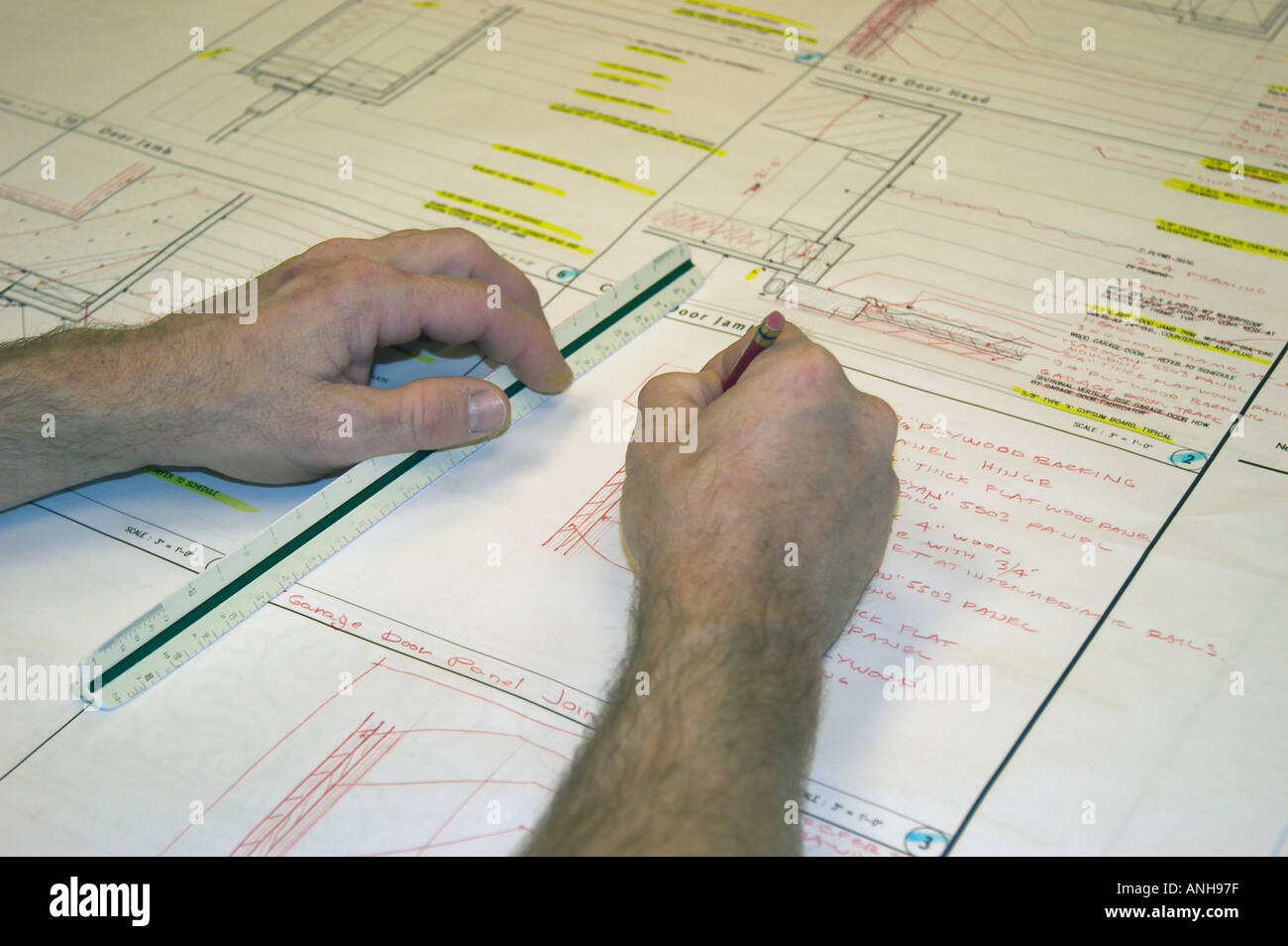 architect drawing plans Stock Photo - Alamy
