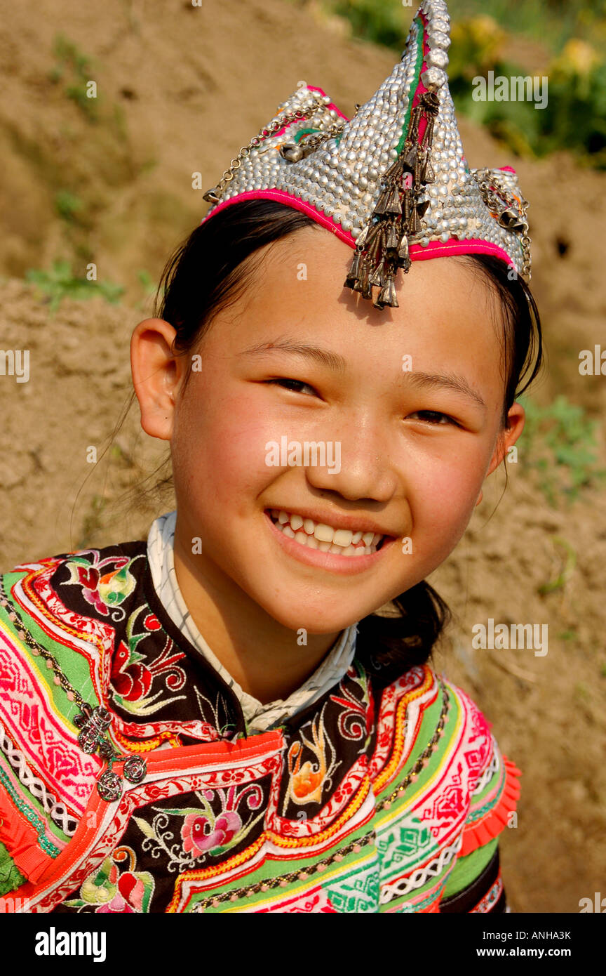 a girl have Yunnan Hani minority traditional clothes go to festival ...