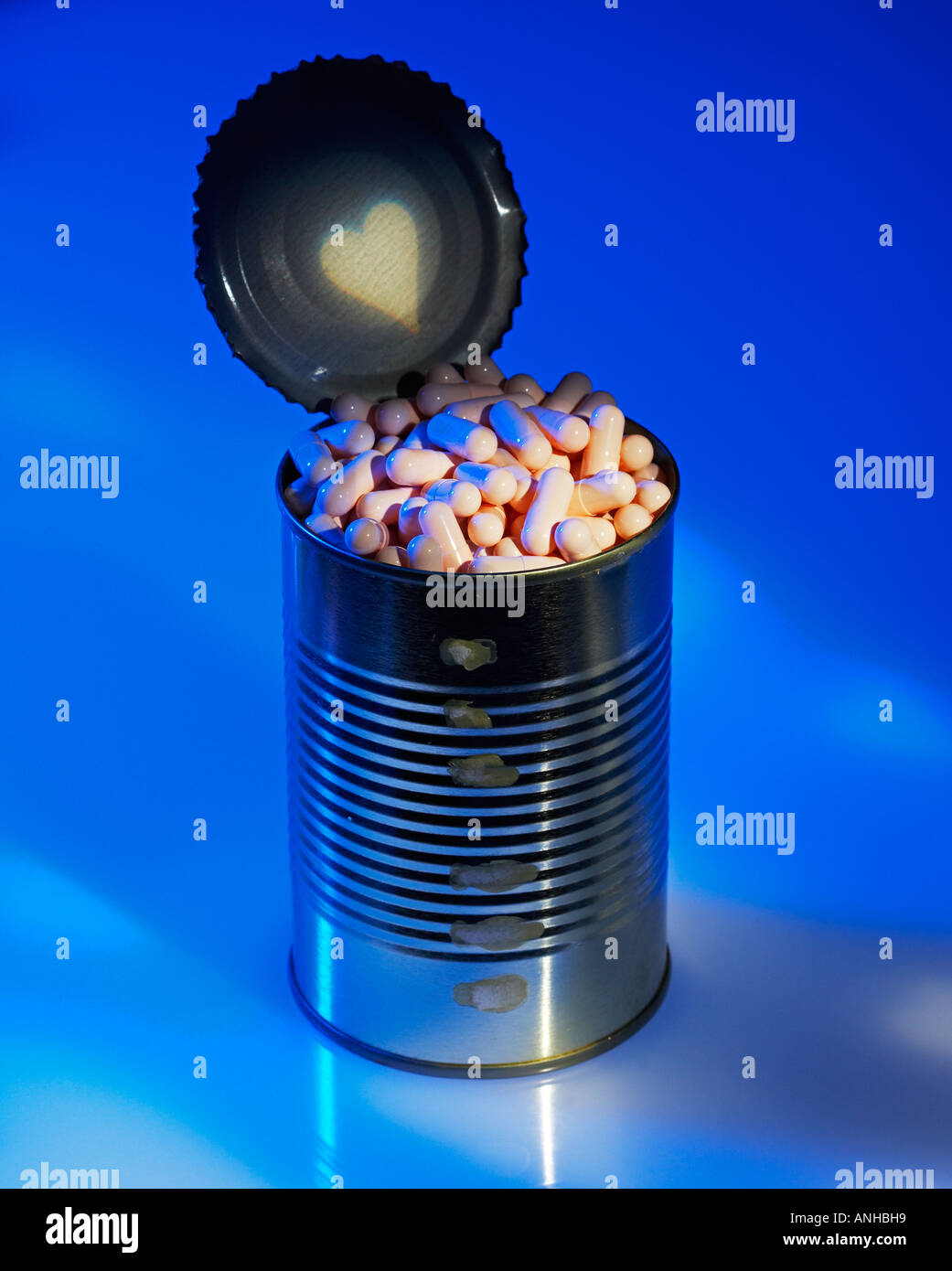 Open Can full of Little Pink Happy Pills with Heart on inside of Can ...