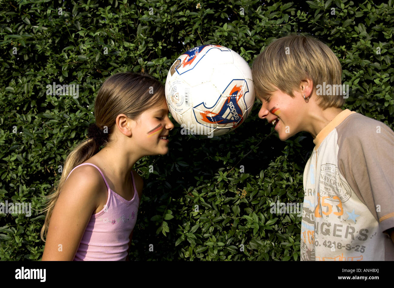 sister and brother，football,German flag Stock Photo - Alamy