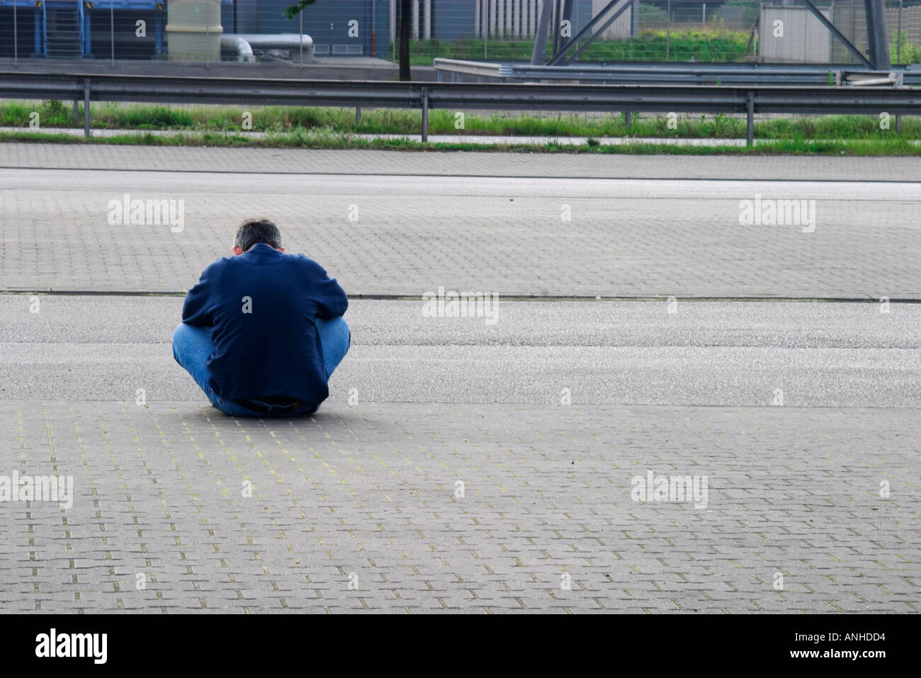 Man alone on the street hi-res stock photography and images - Alamy
