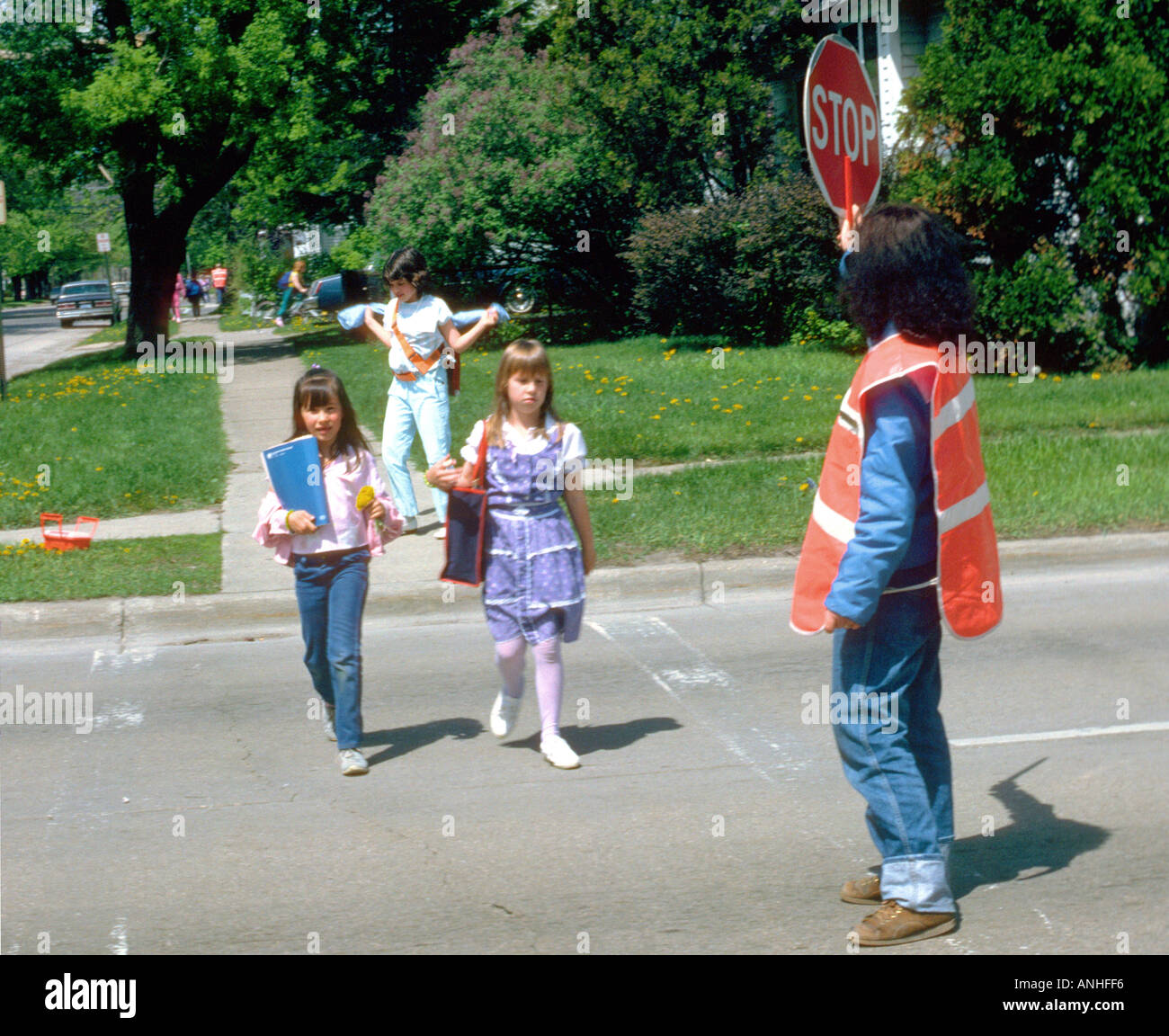 Children crossing street guard hi-res stock photography and images - Alamy