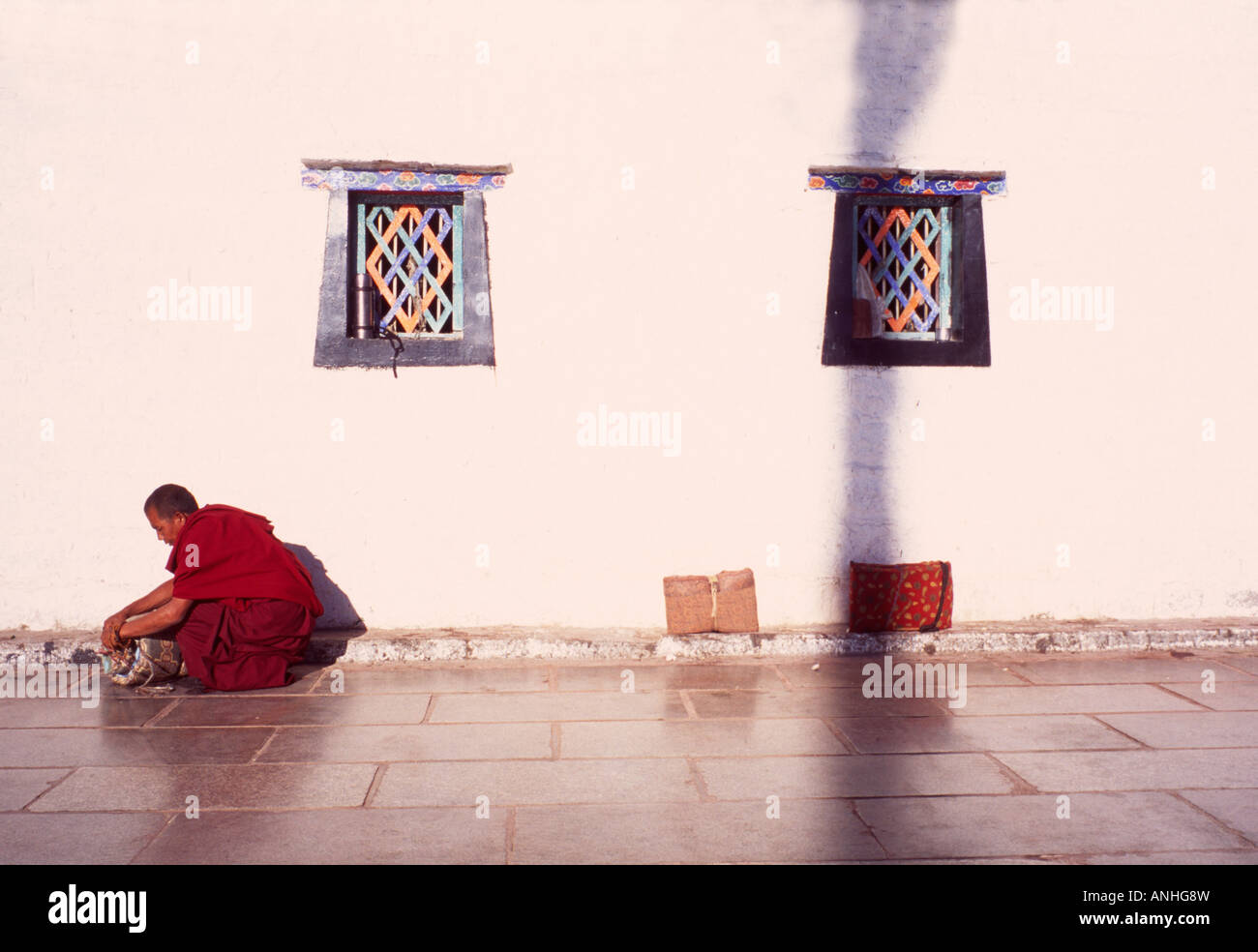 Tibetan monk cleaning hi-res stock photography and images - Alamy