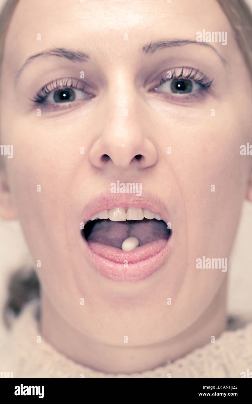 Pill mouth tongue hi-res stock photography and images - Alamy