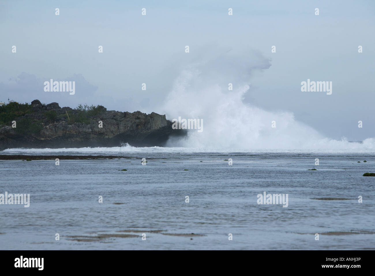 Waves against the coastline Stock Photo - Alamy