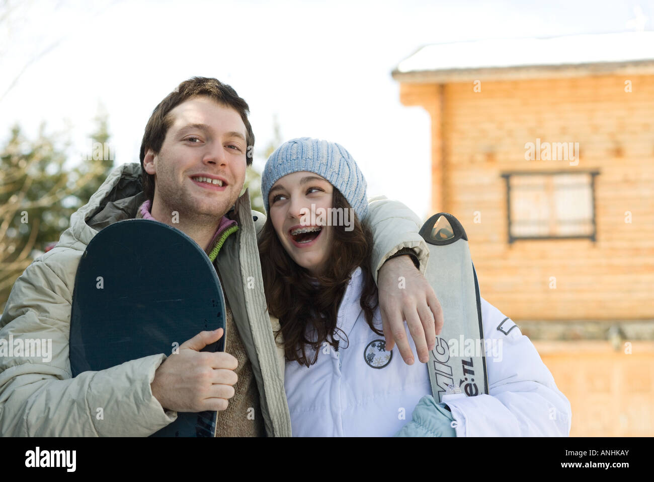 Young skier and snowboarder, smiling, portrait Stock Photo - Alamy