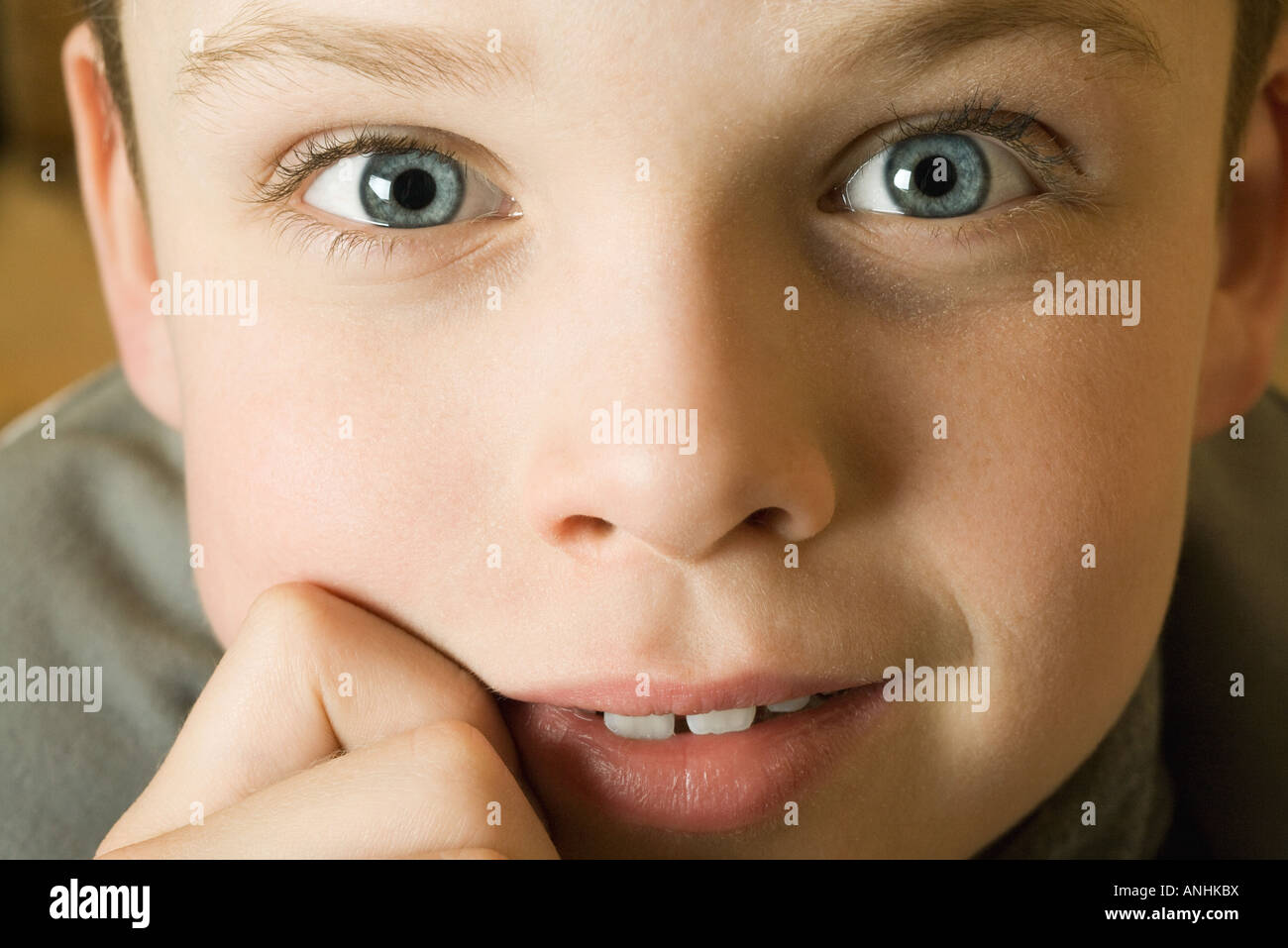 Boy's face, looking at camera, close-up Stock Photo - Alamy