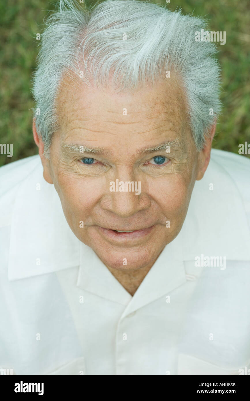 Senior man smiling up at camera, portrait Stock Photo - Alamy