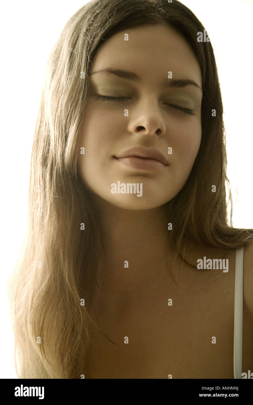 Woman eyes closed front shadow hi-res stock photography and images - Alamy