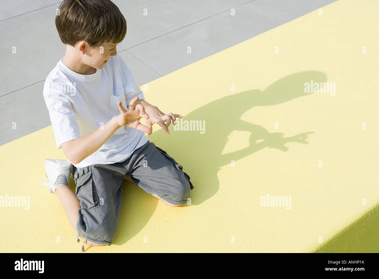 Kneeling Kids High Resolution Stock Photography and Images - Alamy