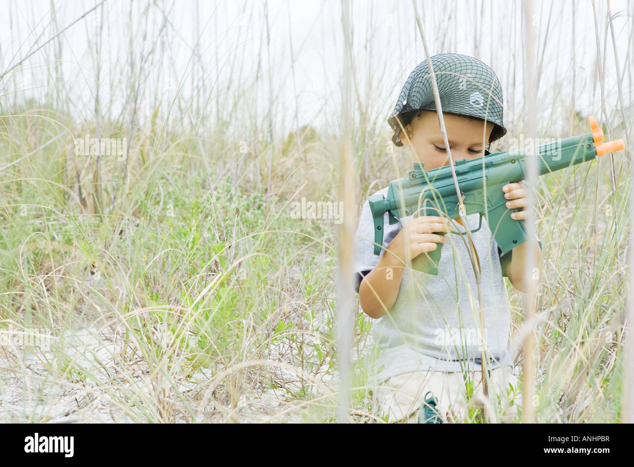 Three children playing soldier hi-res stock photography and images - Alamy