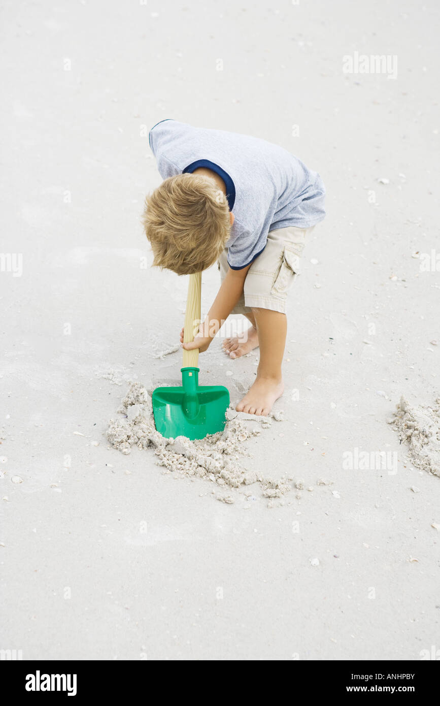 Children Digging In Sand High Resolution Stock Photography and Images ...