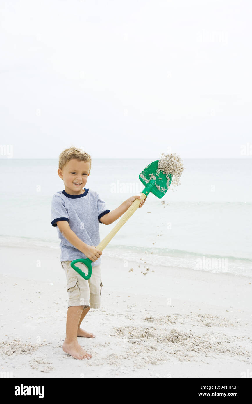 Children Digging In Sand High Resolution Stock Photography and Images ...