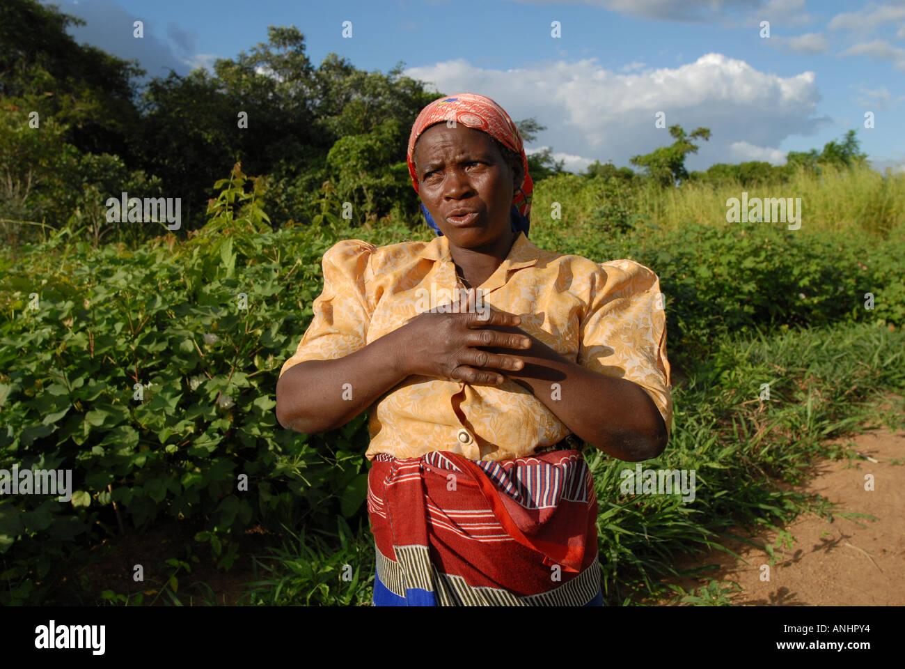 Enelesi Lamusi, a woman farmer, stands on her 5 hectars of land in ...