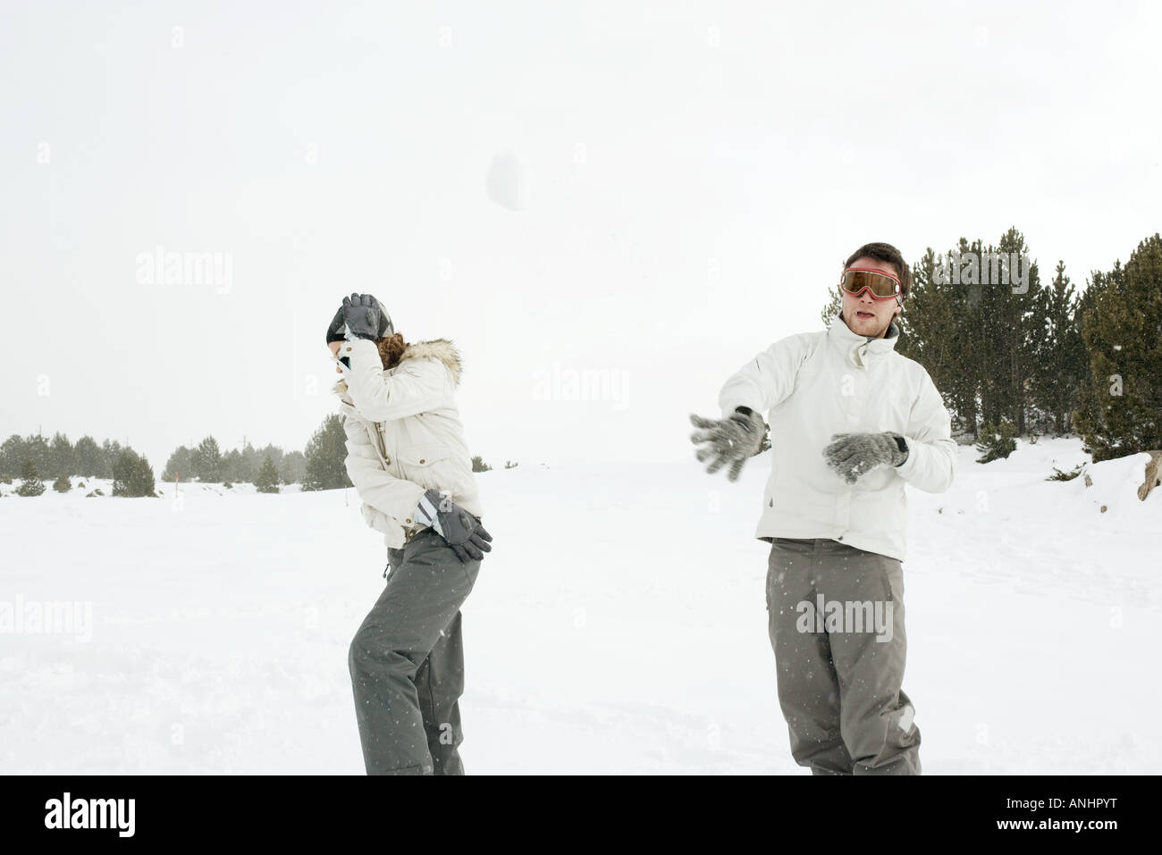 Two people snowball fight on hi-res stock photography and images - Alamy