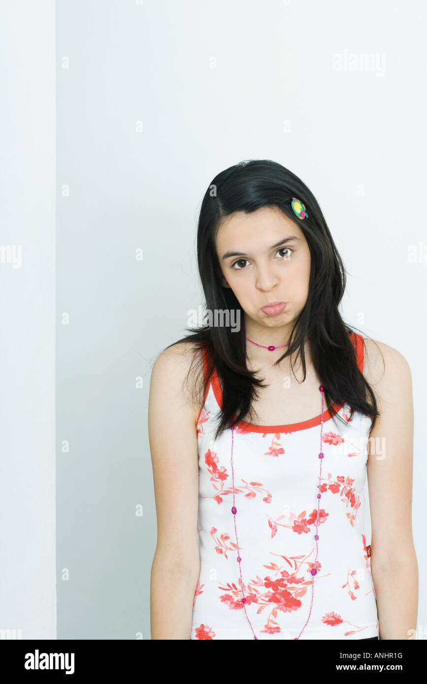 Teenage girl pouting, looking at camera, portrait Stock Photo - Alamy Teenage girl pouting, looking at camera, portrait Stock Photo - Alamy