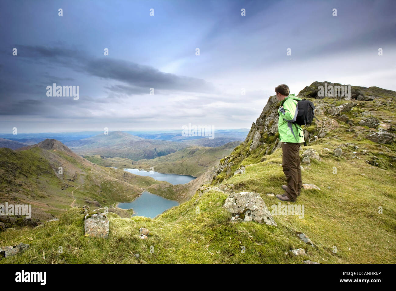 Lone walker taking in the views of the Welsh Mountains and Lakes Stock ...