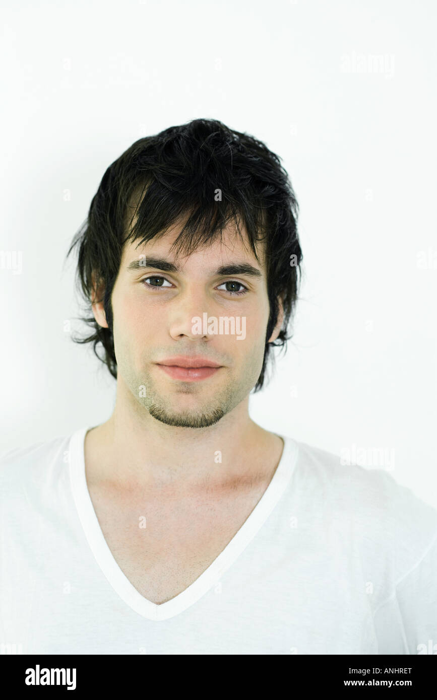 Young man with goatee smiling at camera, portrait Stock Photo - Alamy