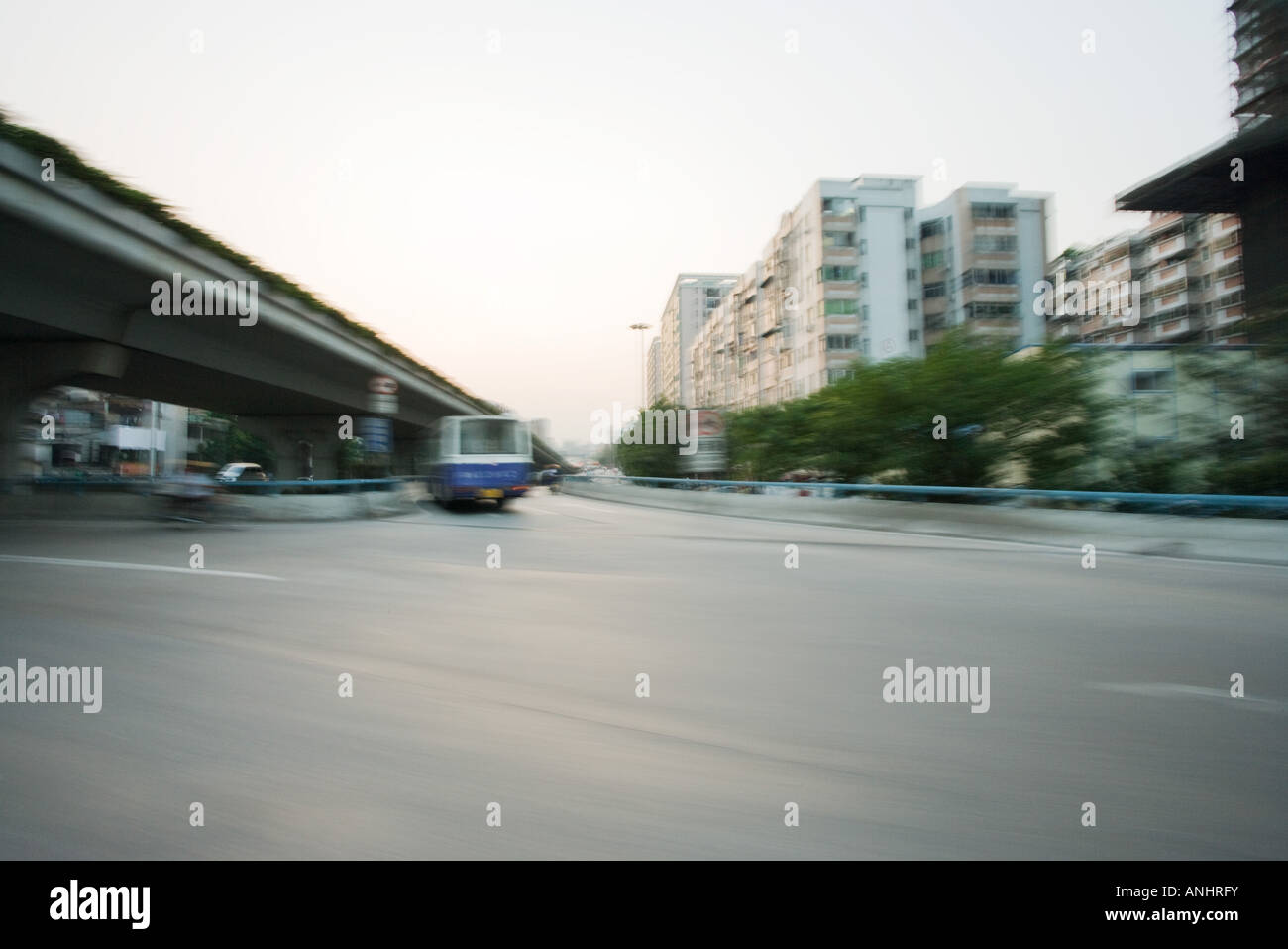 Bus entering exit ramp from freeway, rear view Stock Photo - Alamy