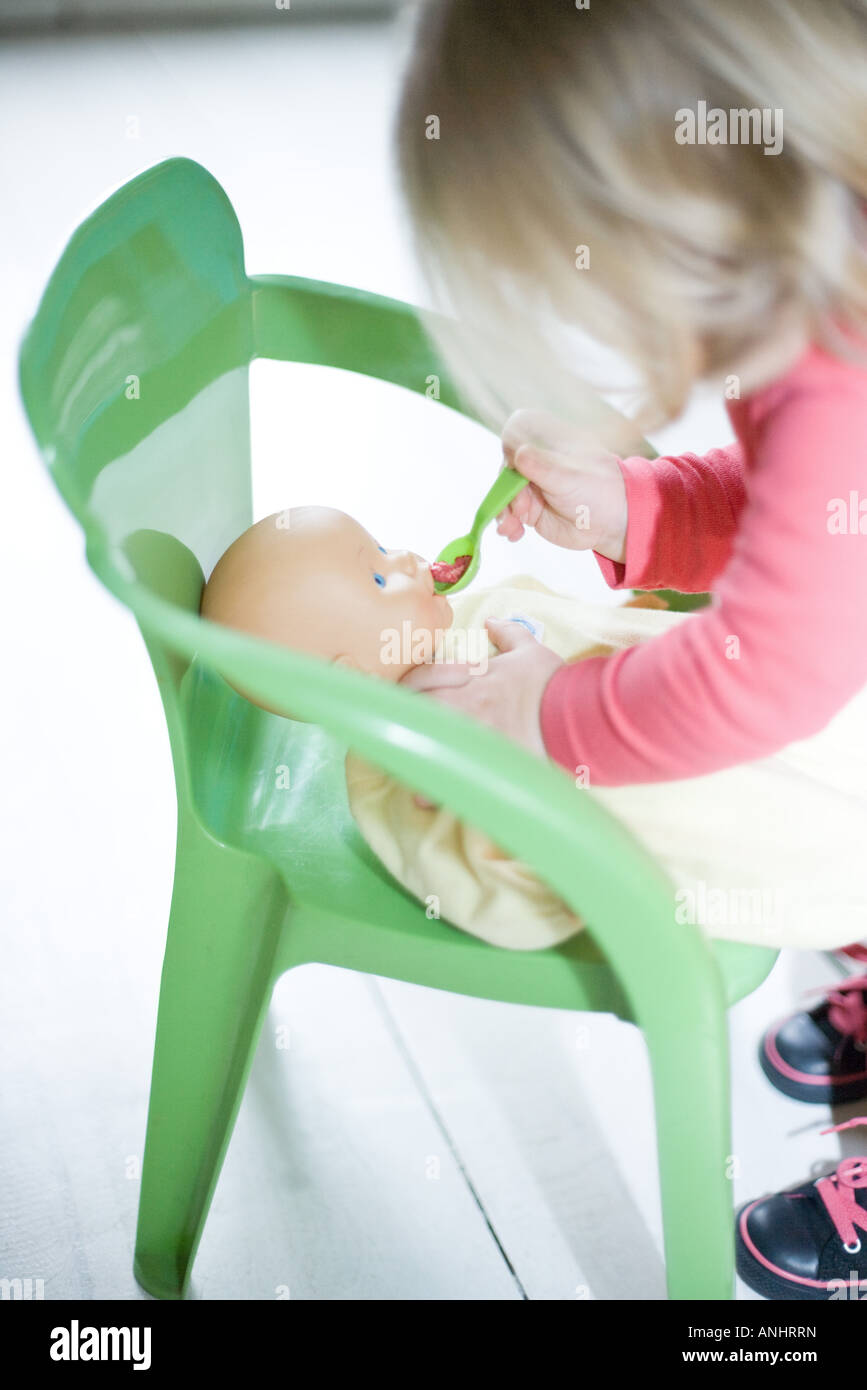 Feed dolls hi-res stock photography and images - Alamy
