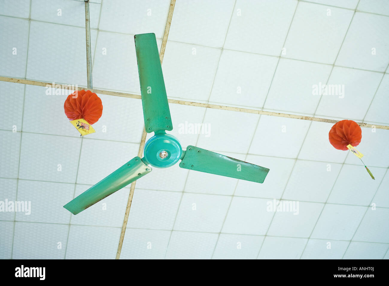 Ceiling fan and decorations, low angle view Stock Photo - Alamy