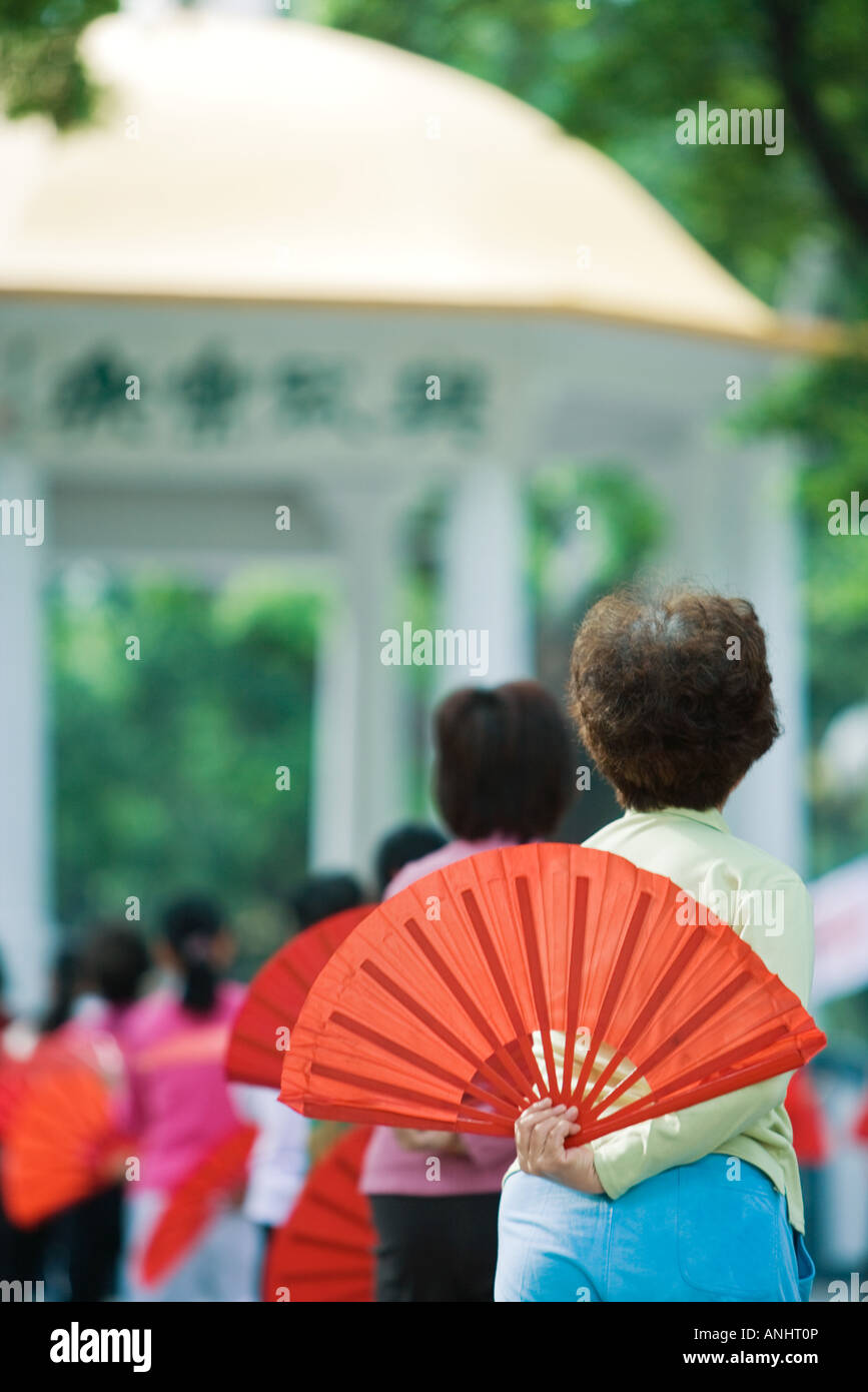 China, women dancing with fans, outdoors Stock Photo - Alamy