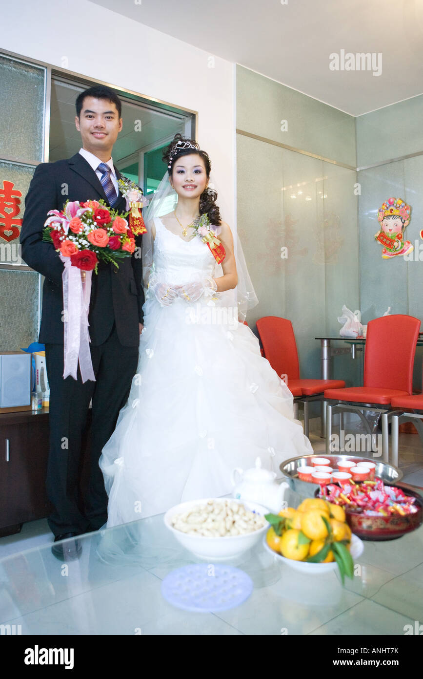 Chinese wedding, bride and groom, full length portrait Stock Photo - Alamy