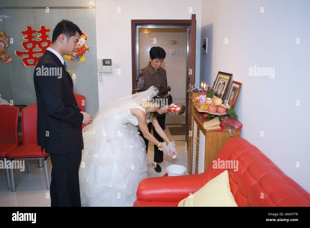 Chinese wedding, bride taking offering to ancestral shrine Stock Photo ...