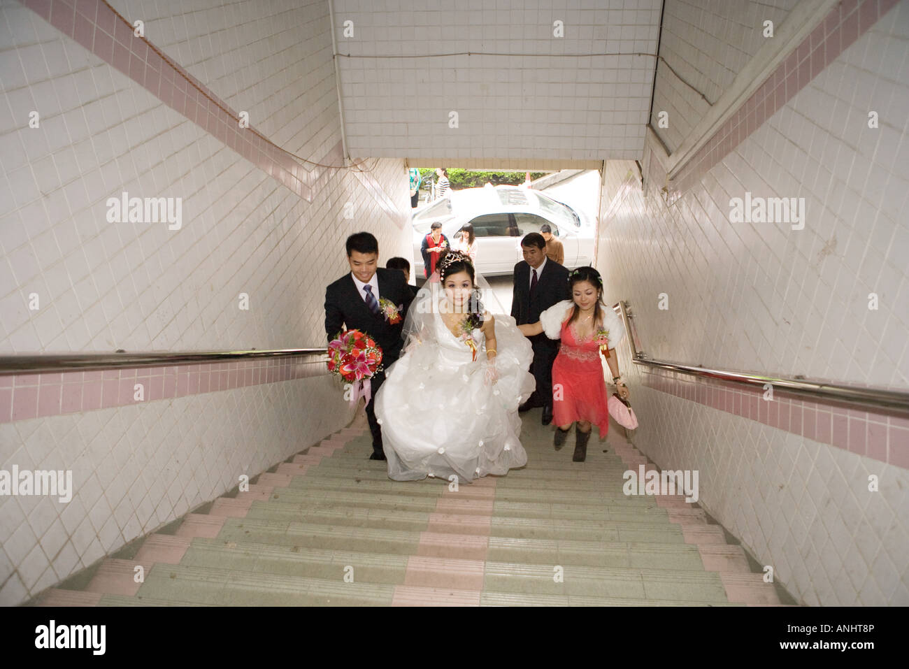 Wedding procession walking up stairs, high angle view Stock Photo - Alamy
