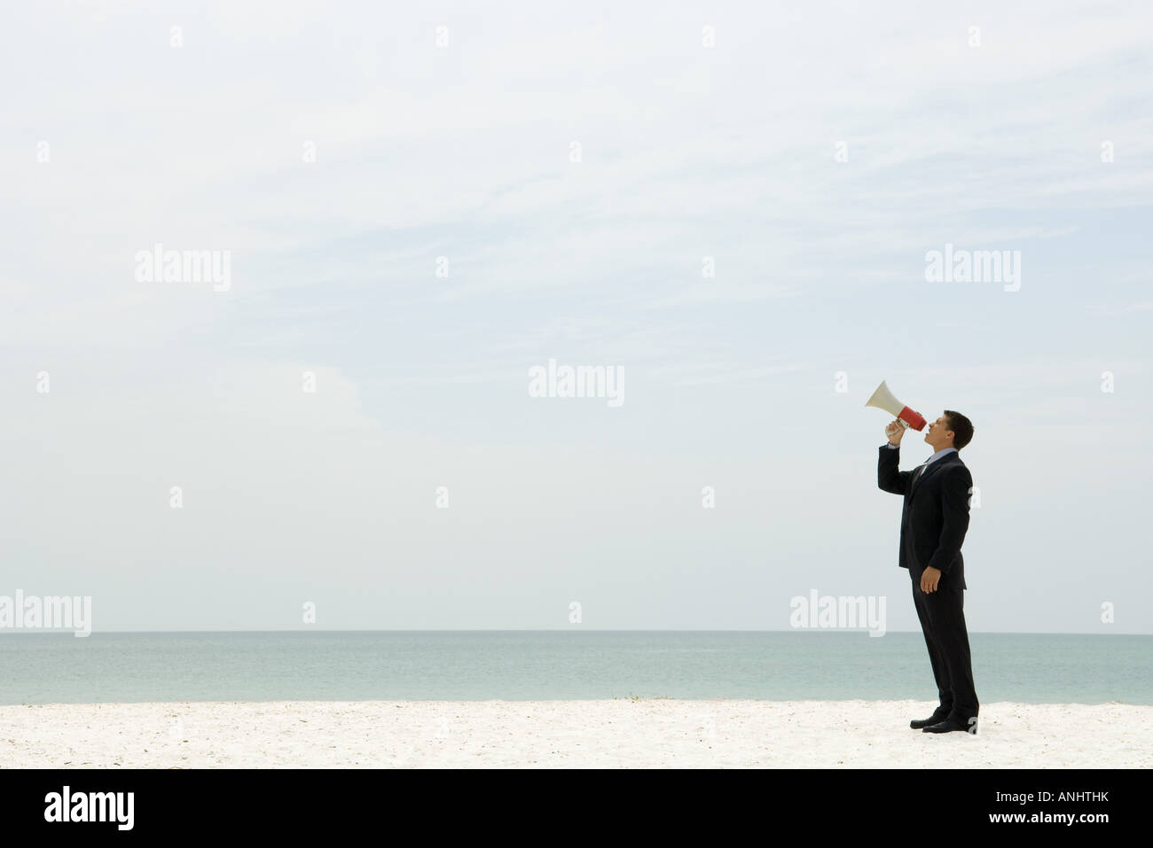 Standing holding communication megaphone authority hi-res stock ...