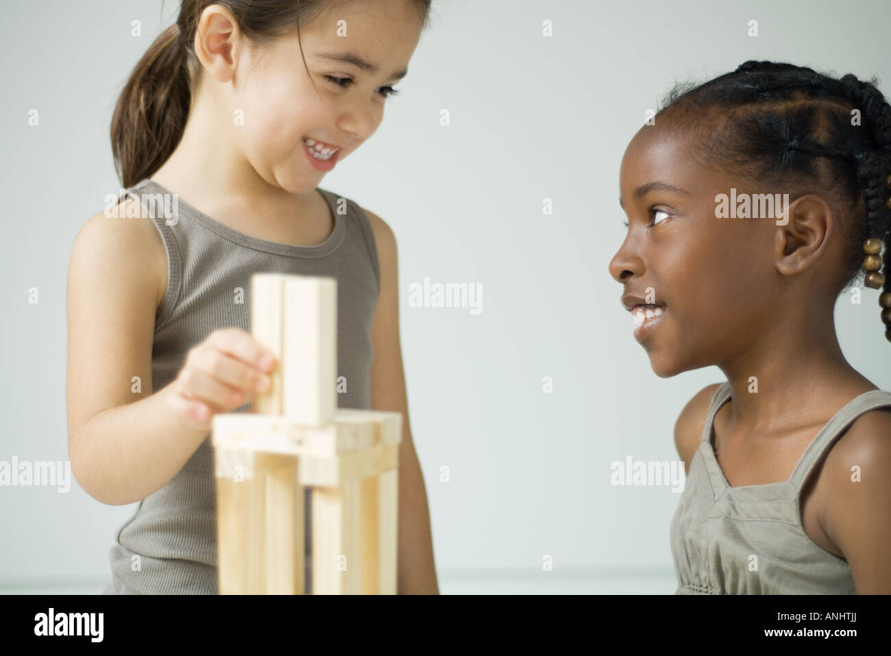 Two Girls Playing With Blocks Together High Resolution Stock ...