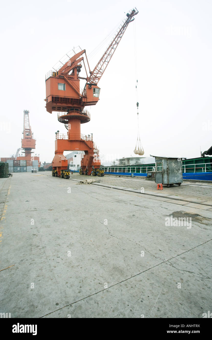 Loading crane in shipyard Stock Photo - Alamy