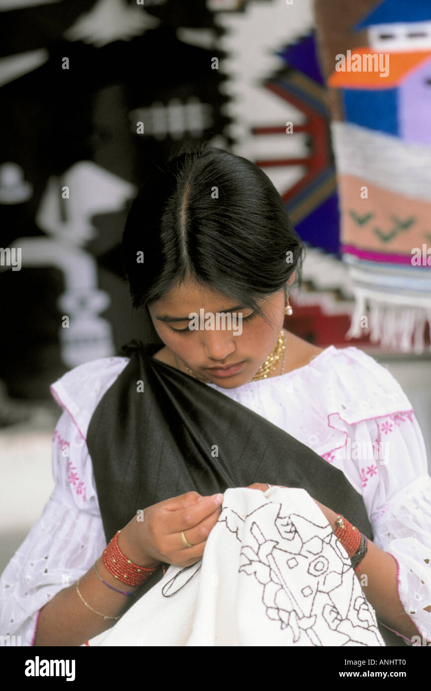 Ecuador Otavalo market young woman making embroidery Stock Photo - Alamy
