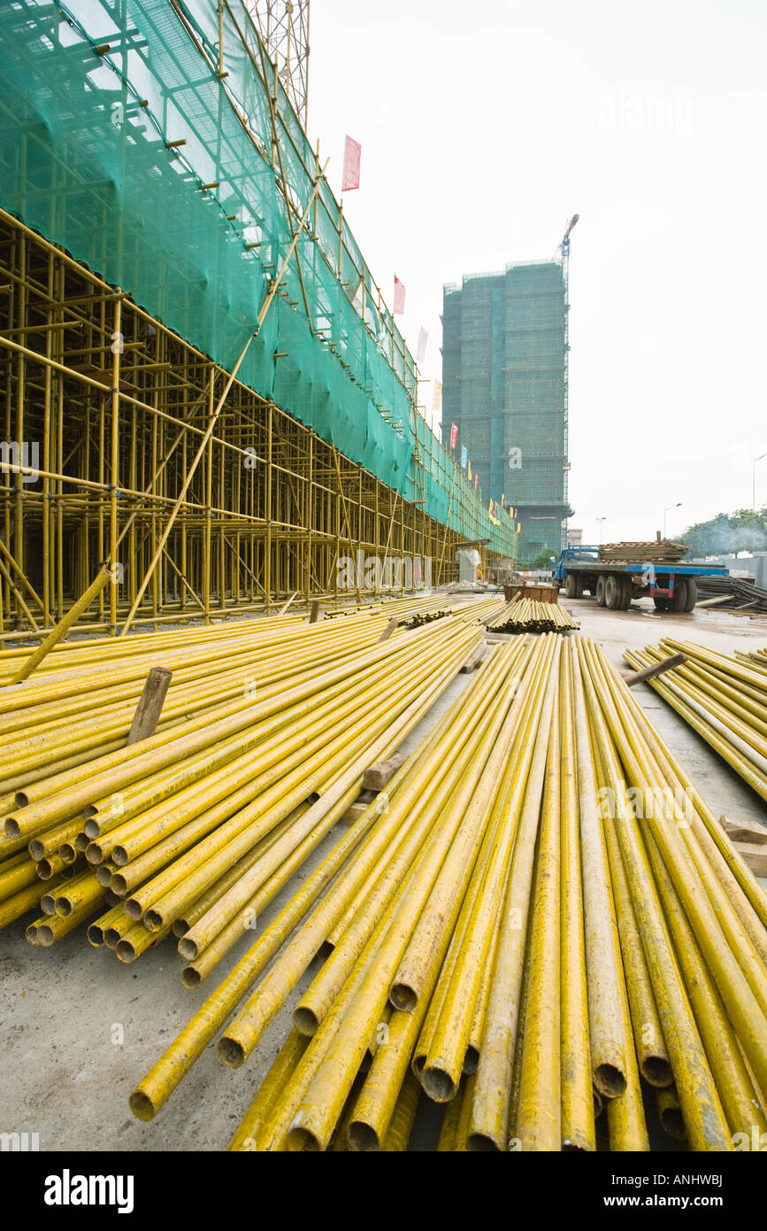 Construction site, metal beams on ground Stock Photo - Alamy