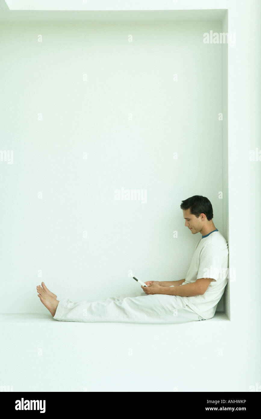 Side View Person Sitting Ledge 260+ Sitting On Ledge Stock