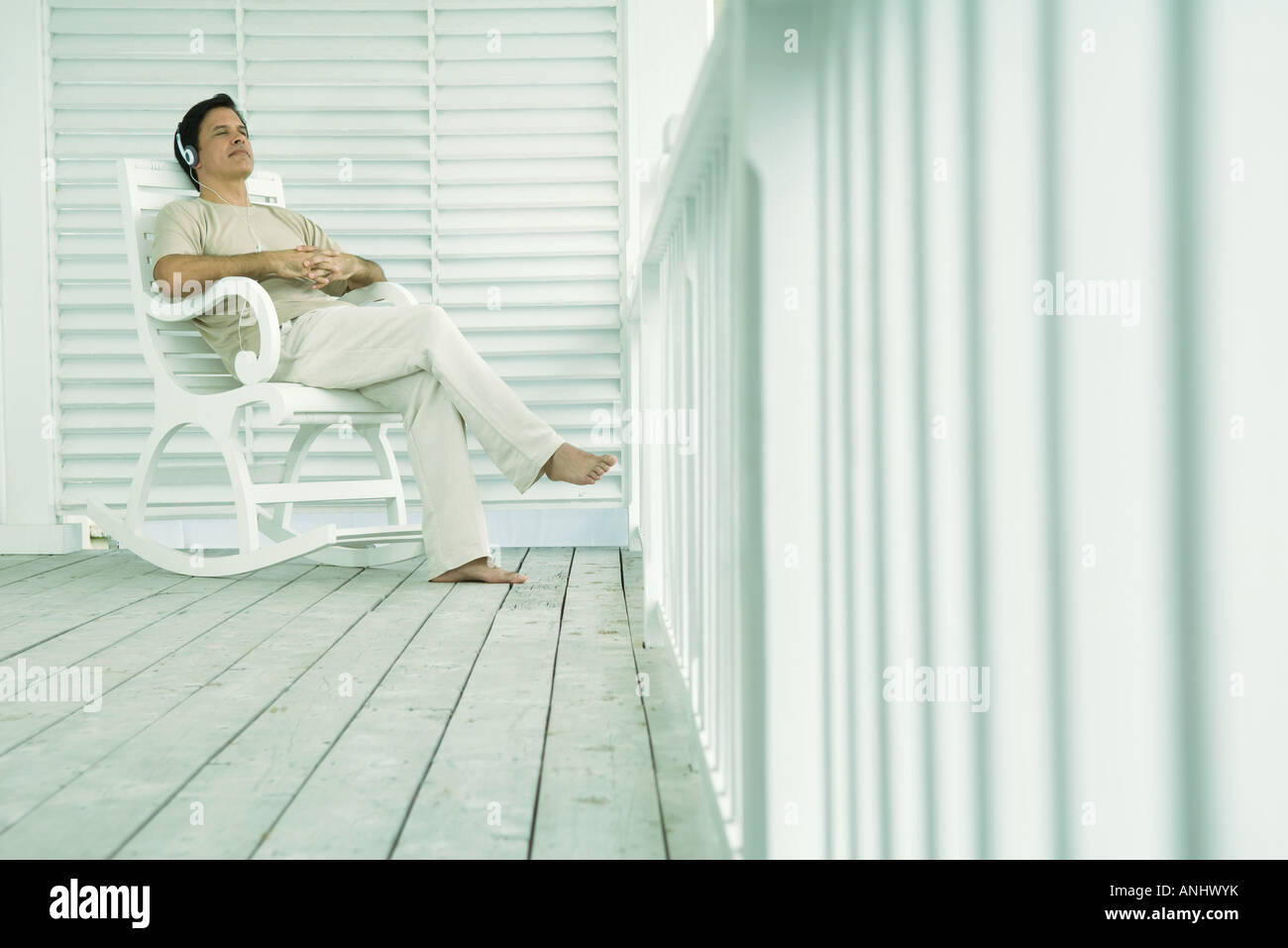 Mature man sitting in rocking hi-res stock photography and images - Alamy