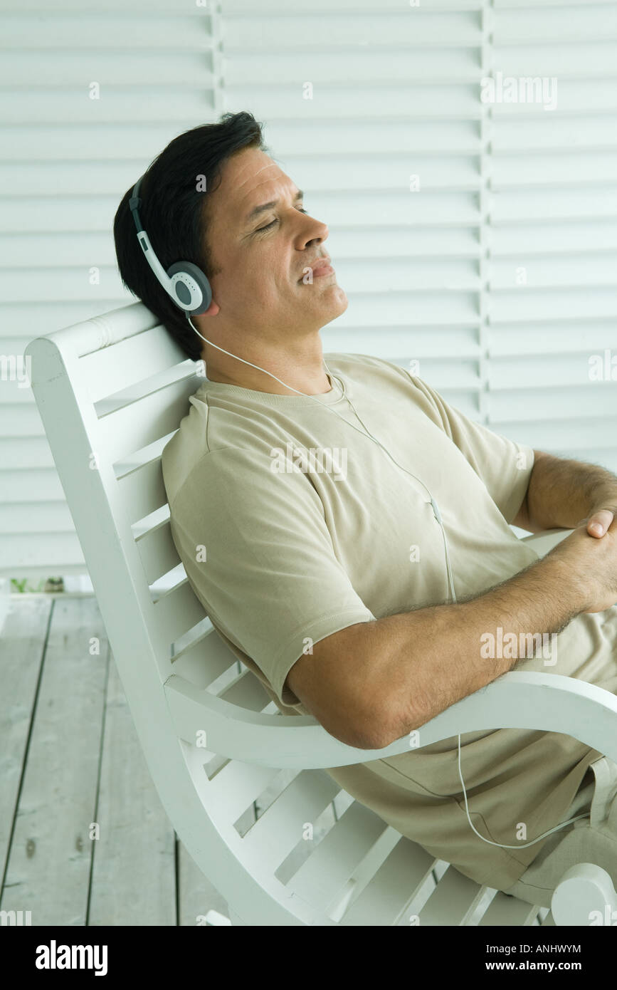 Mature man sitting in rocking hi-res stock photography and images - Alamy