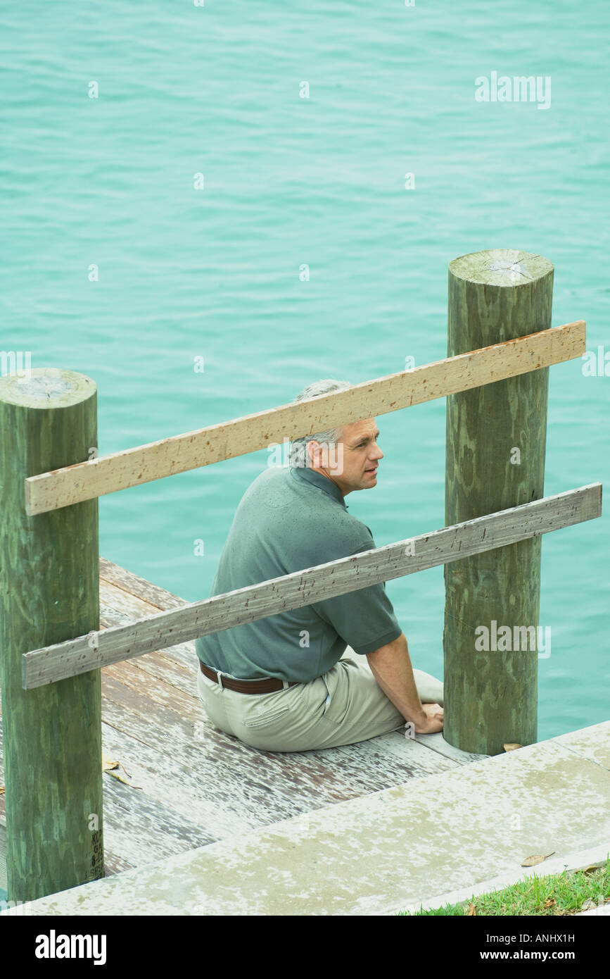 Rear view male sitting elevated view hi-res stock photography and ...