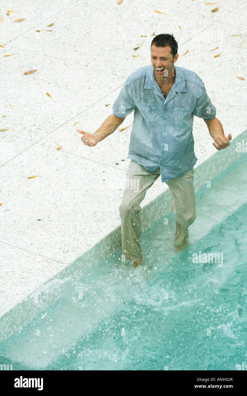 Fully clothed in water hi-res stock photography and images - Alamy