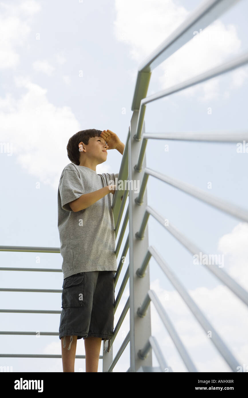 Children looking at sky from balcony hi-res stock photography and ...