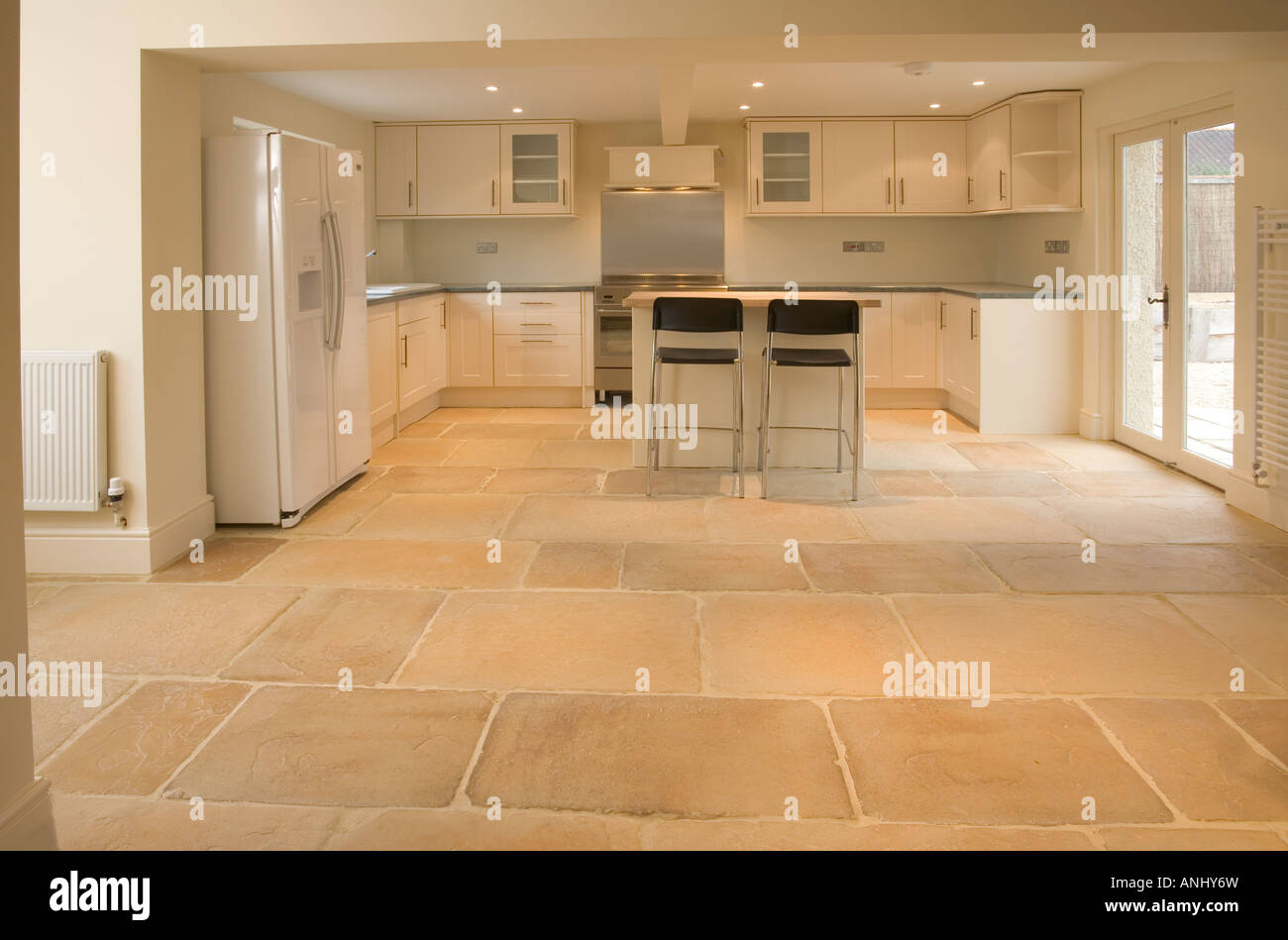 New property interior, fitted kitchen, empty dining area Stock Photo ...
