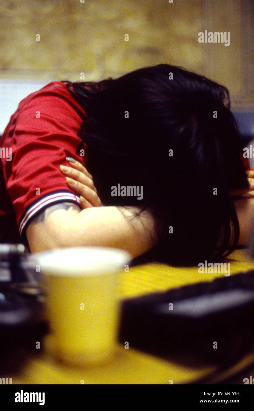 A lady working the night shift in a Mini Cab office, Newcastle upon ...