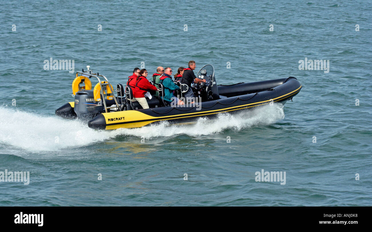 Inflatable Speedboat with passengers, The Solent, UK Stock Photo - Alamy
