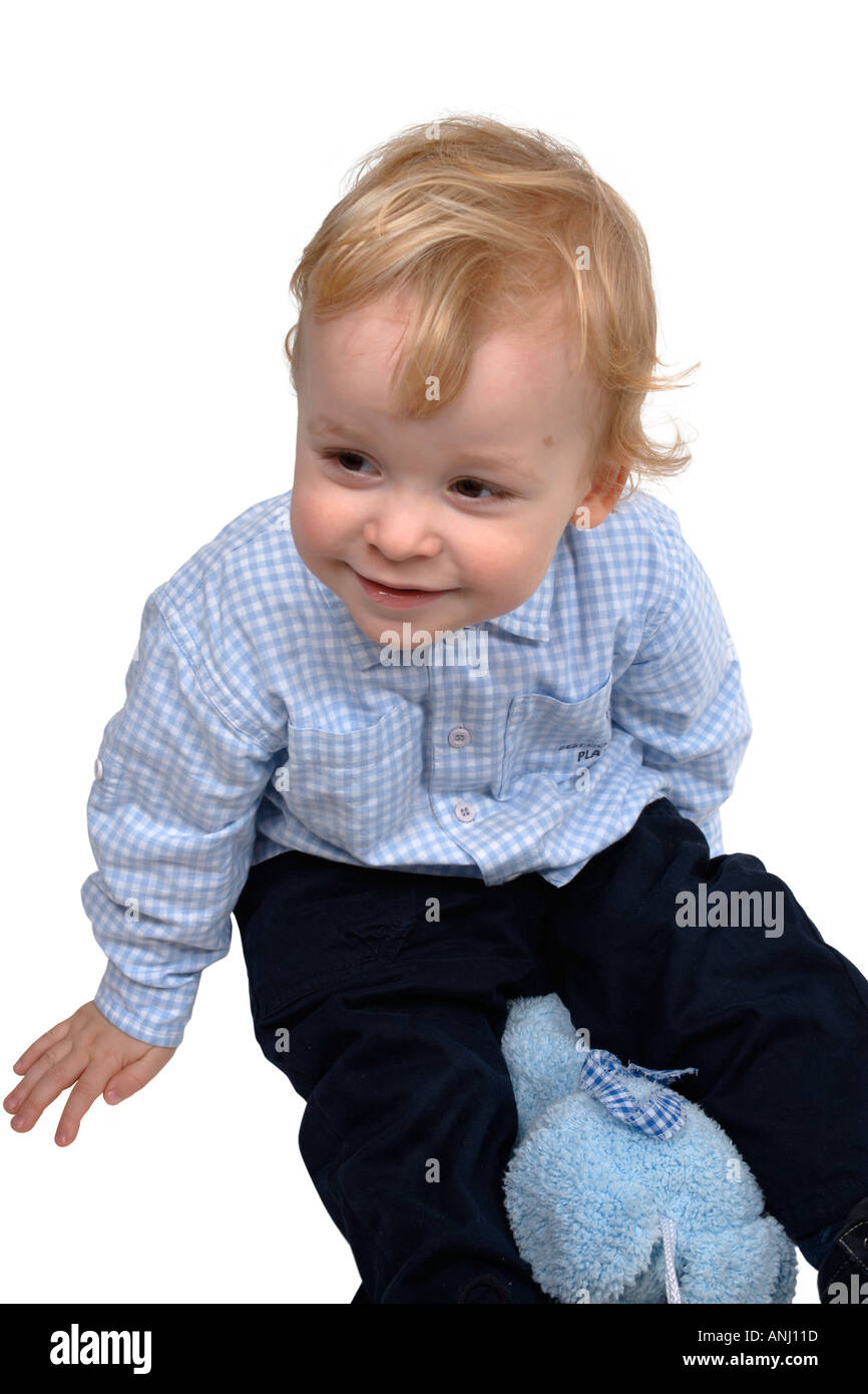 Little Child Sitting on the Floor Stock Photo - Alamy